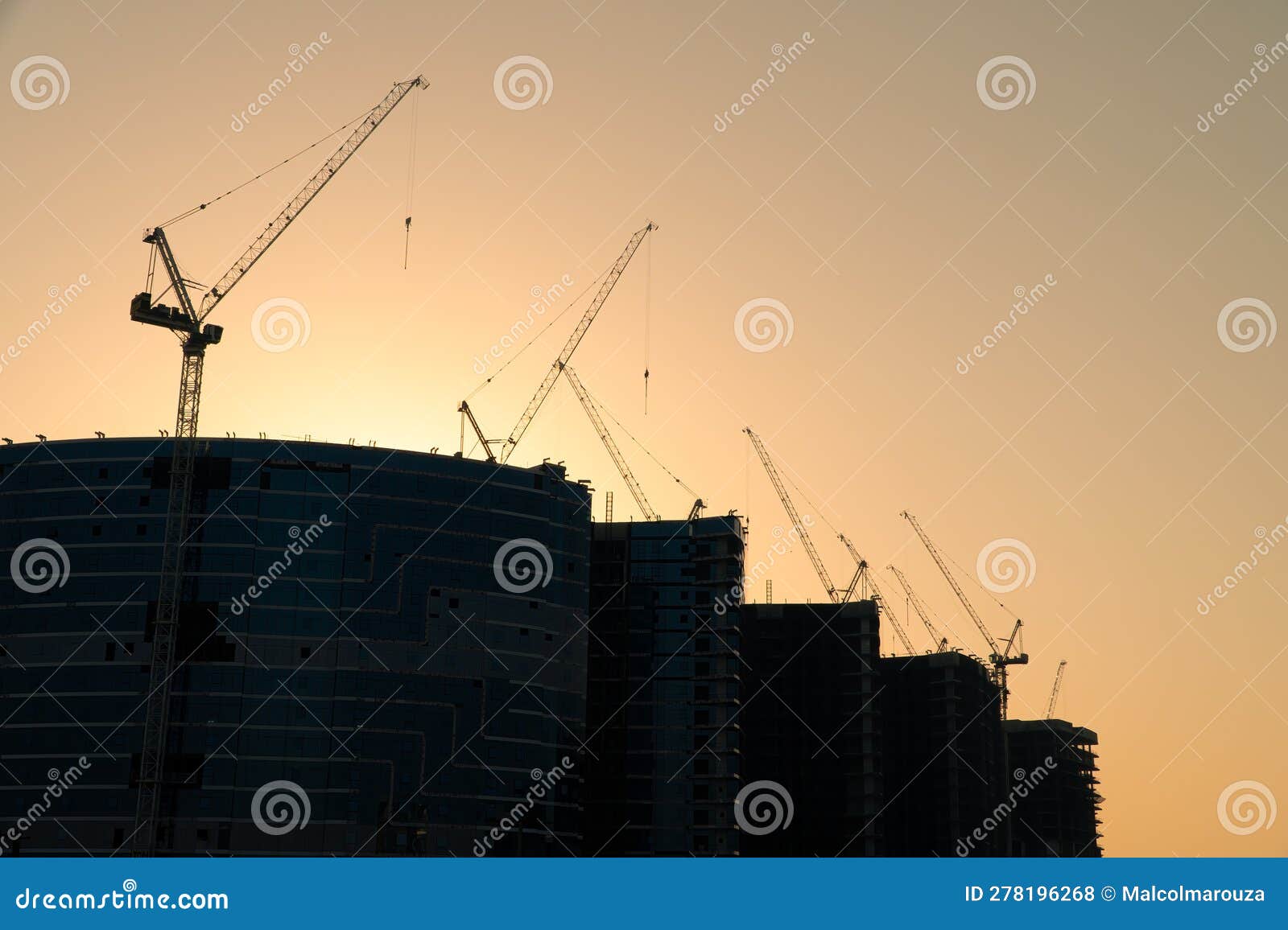 Multiple Tower Cranes at Dusk Stock Photo - Image of growth ...