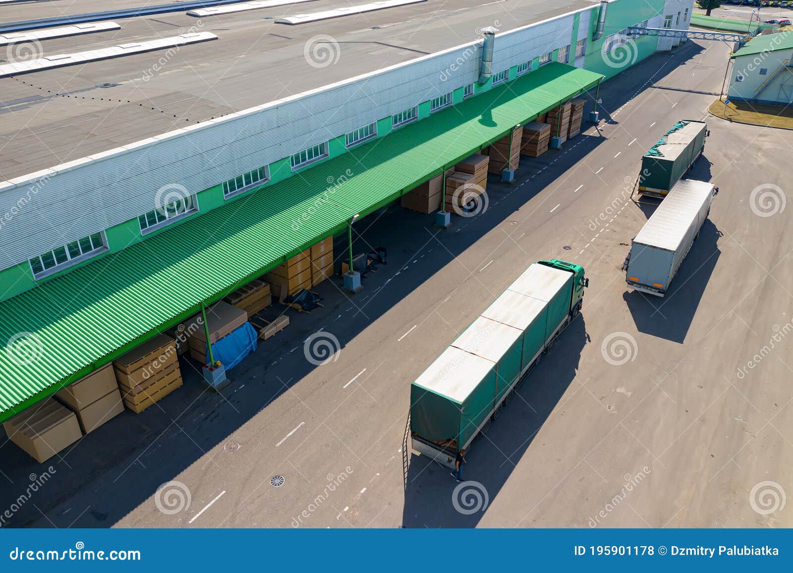 Trucks Loading At A Depot Of A Forwarding Agency - Transport And ...