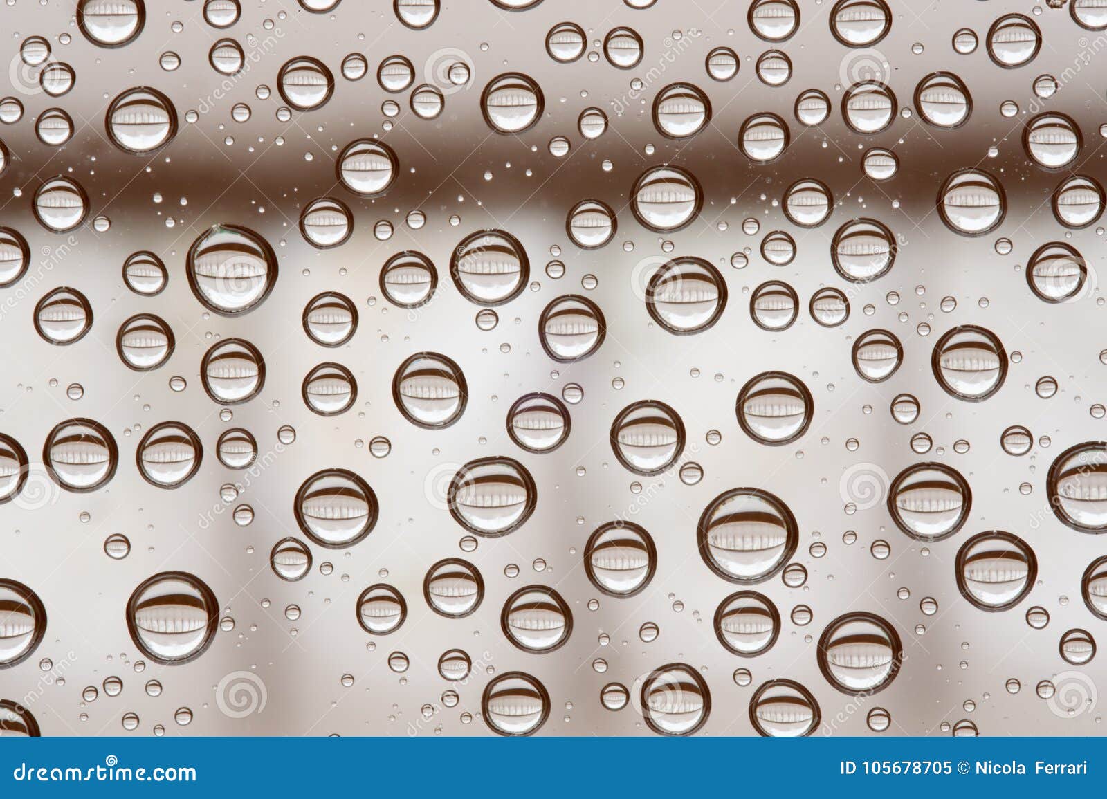 Multiple Water Drops or Raindrops of Different Sizes on a Window Glass ...