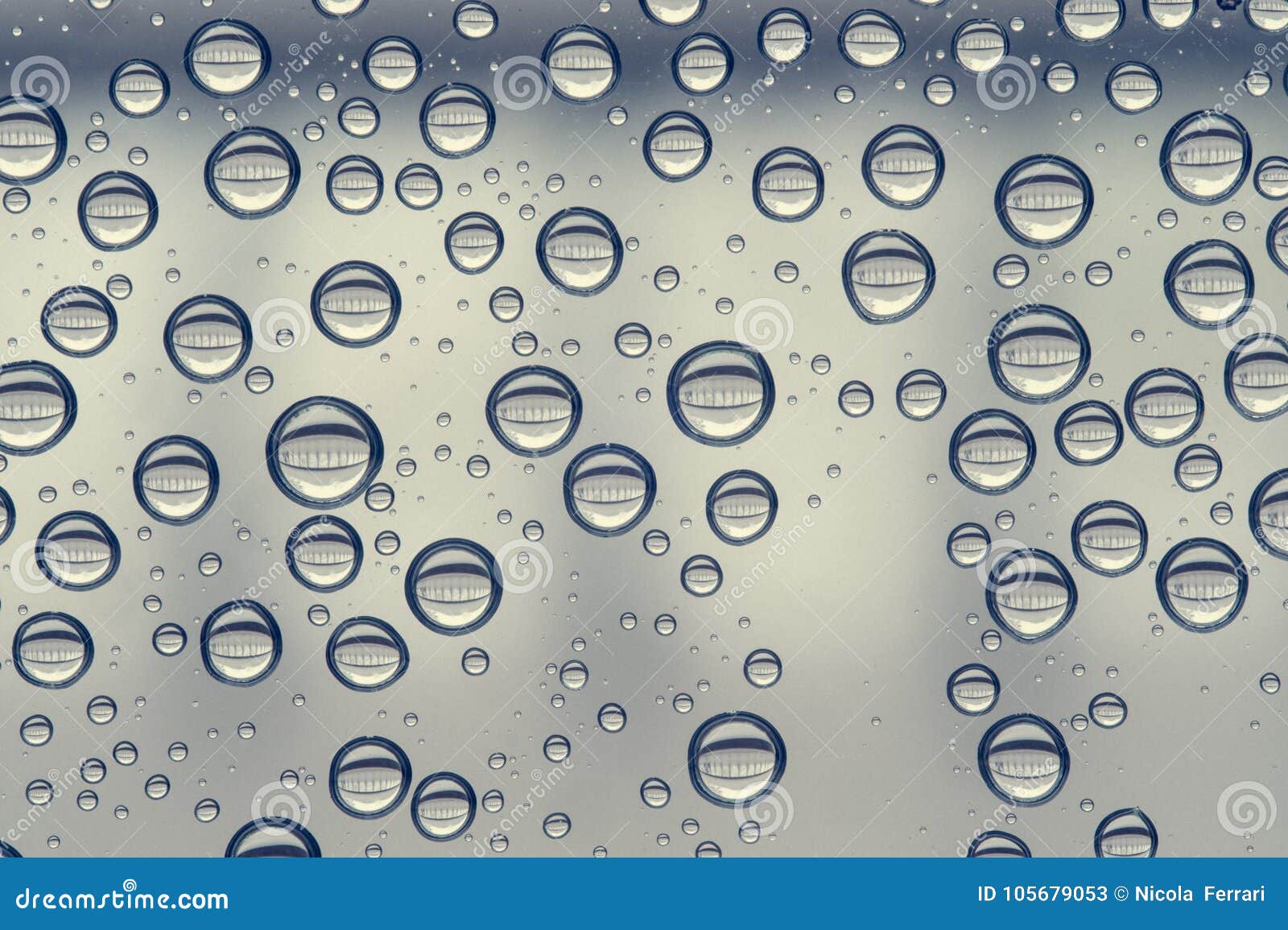 Multiple Water Drops or Raindrops of Different Sizes on a Window Glass ...