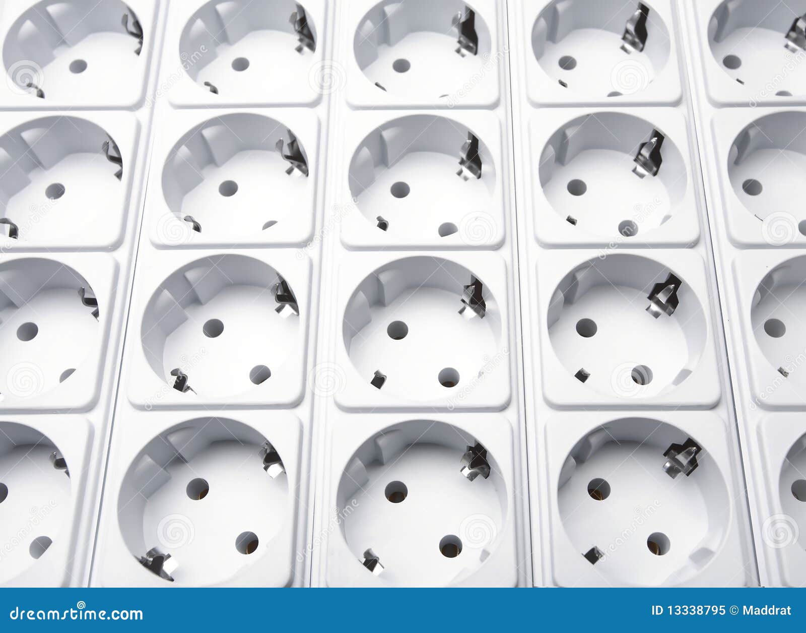 Multiple white outlet stock image. Image of wired, cable - 13338795
