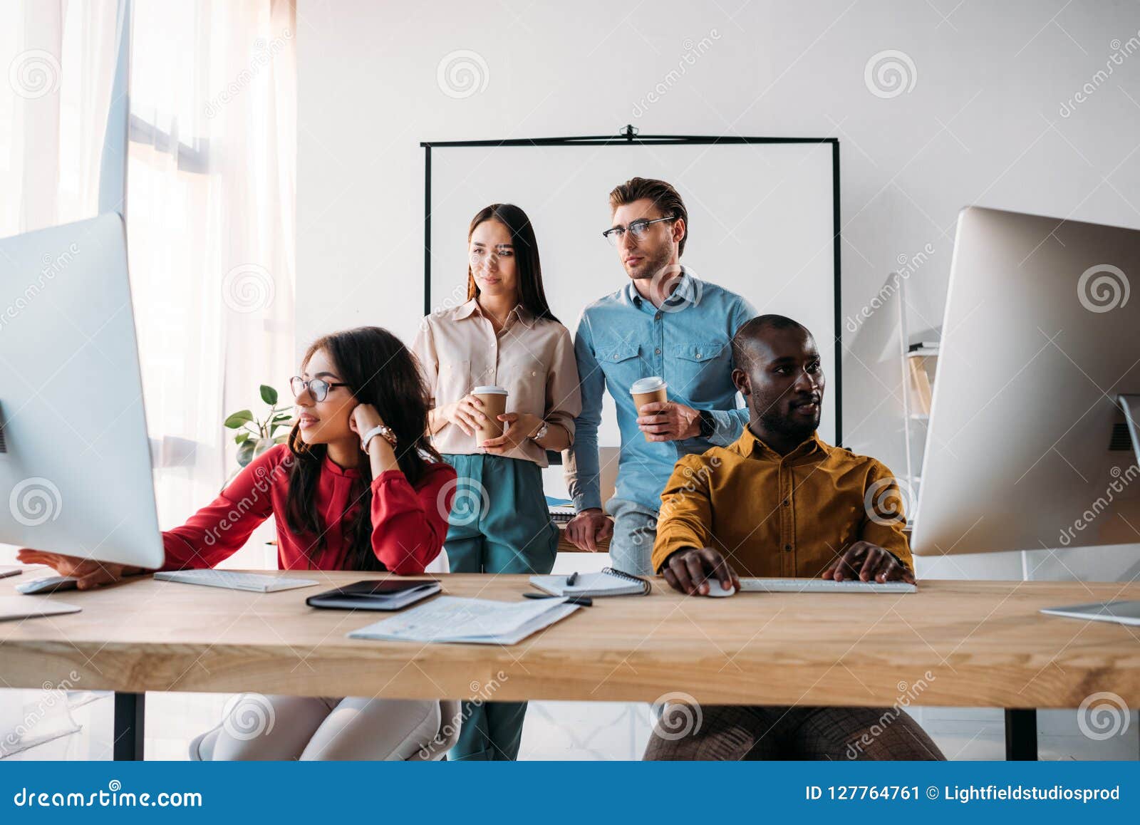Multiracial Business Team Working on Project Together Stock Image ...