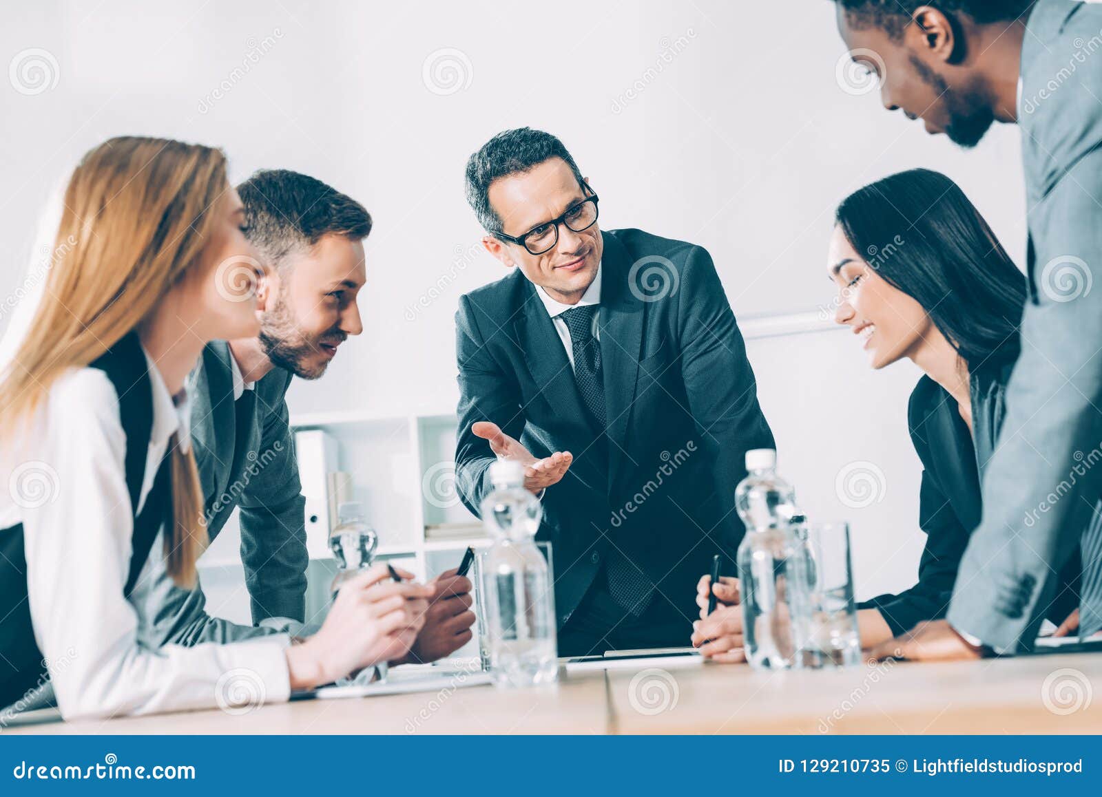 Multiracial Businesspeople Having Conversation Stock Image - Image of ... Multiracial Businesspeople Having Conversation Stock Image - Image of ...