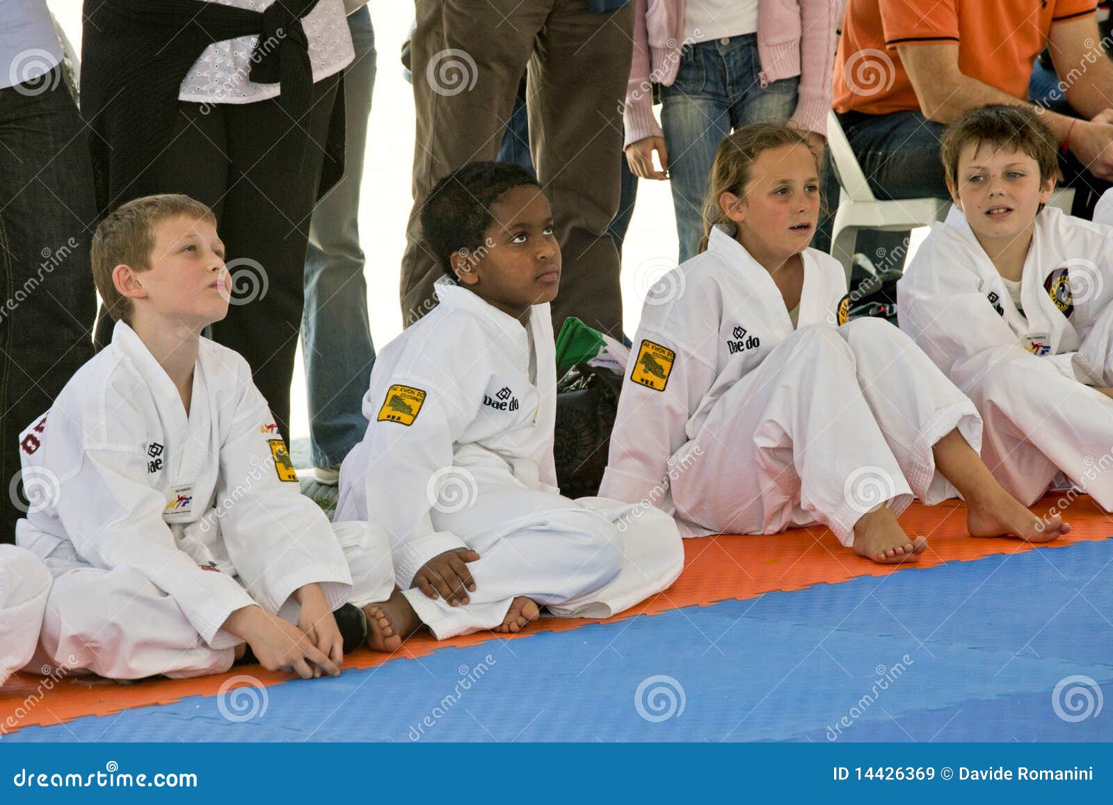 Multiracial Children Sitting on the Mat Editorial Stock Image - Image ...
