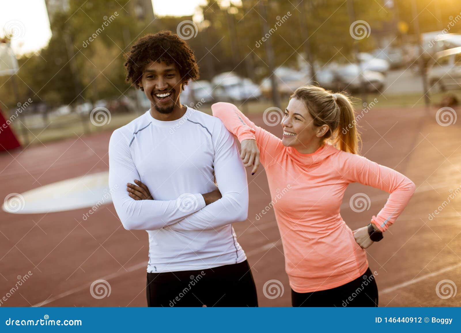 Multiracial Runners In A Modern Handshake To Show Each Other Friendship ...