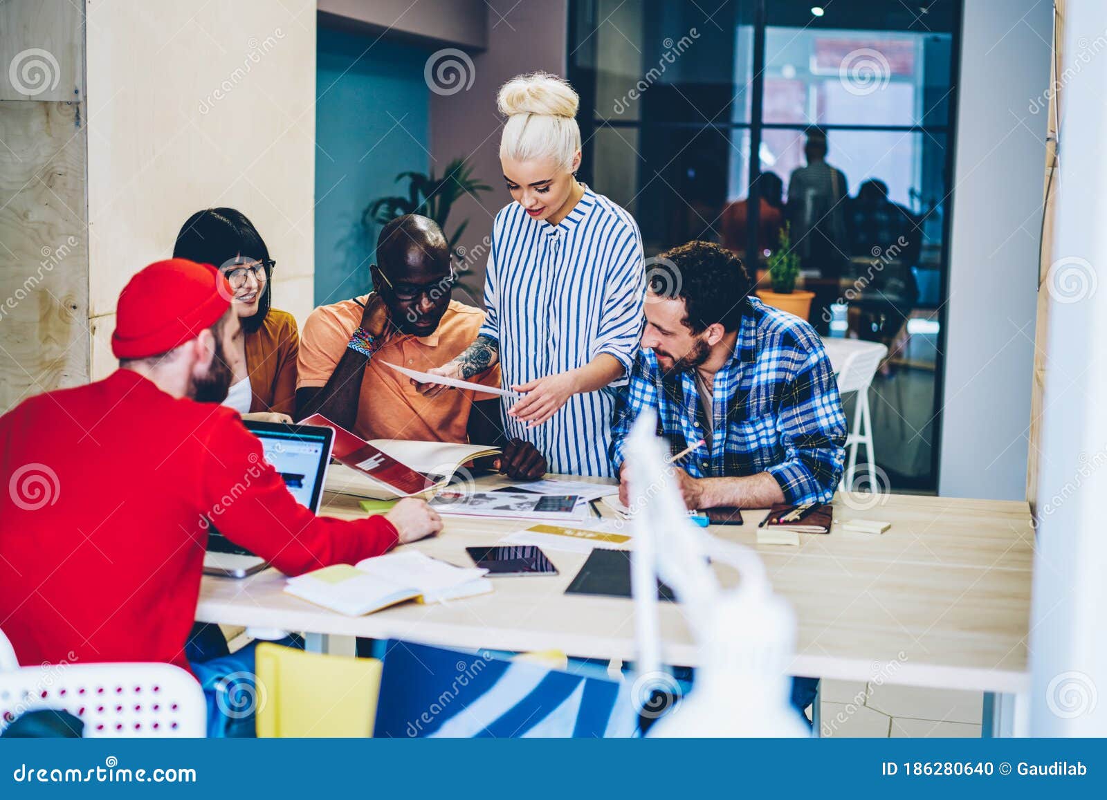 Multiracial Crew of Skilled Clever Students Cooperating on Project and ...