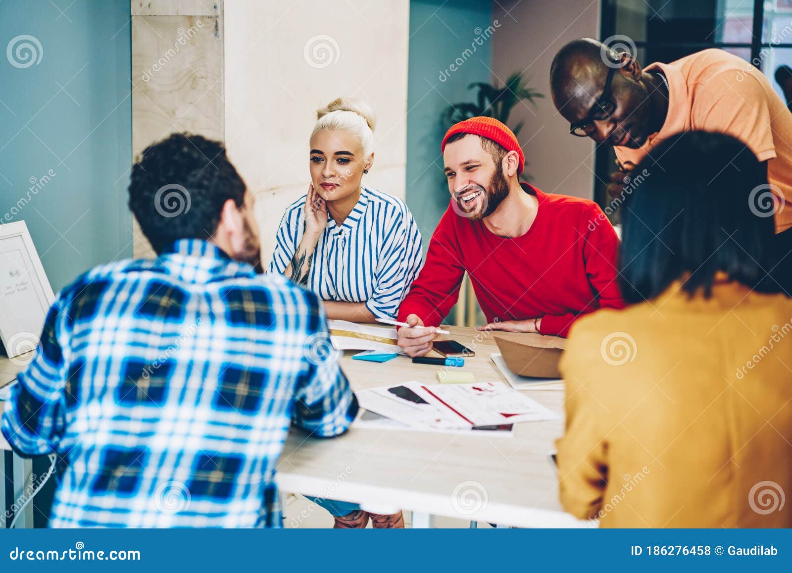 Multiracial Crew of Skilled Clever Students Cooperating on Project and ...