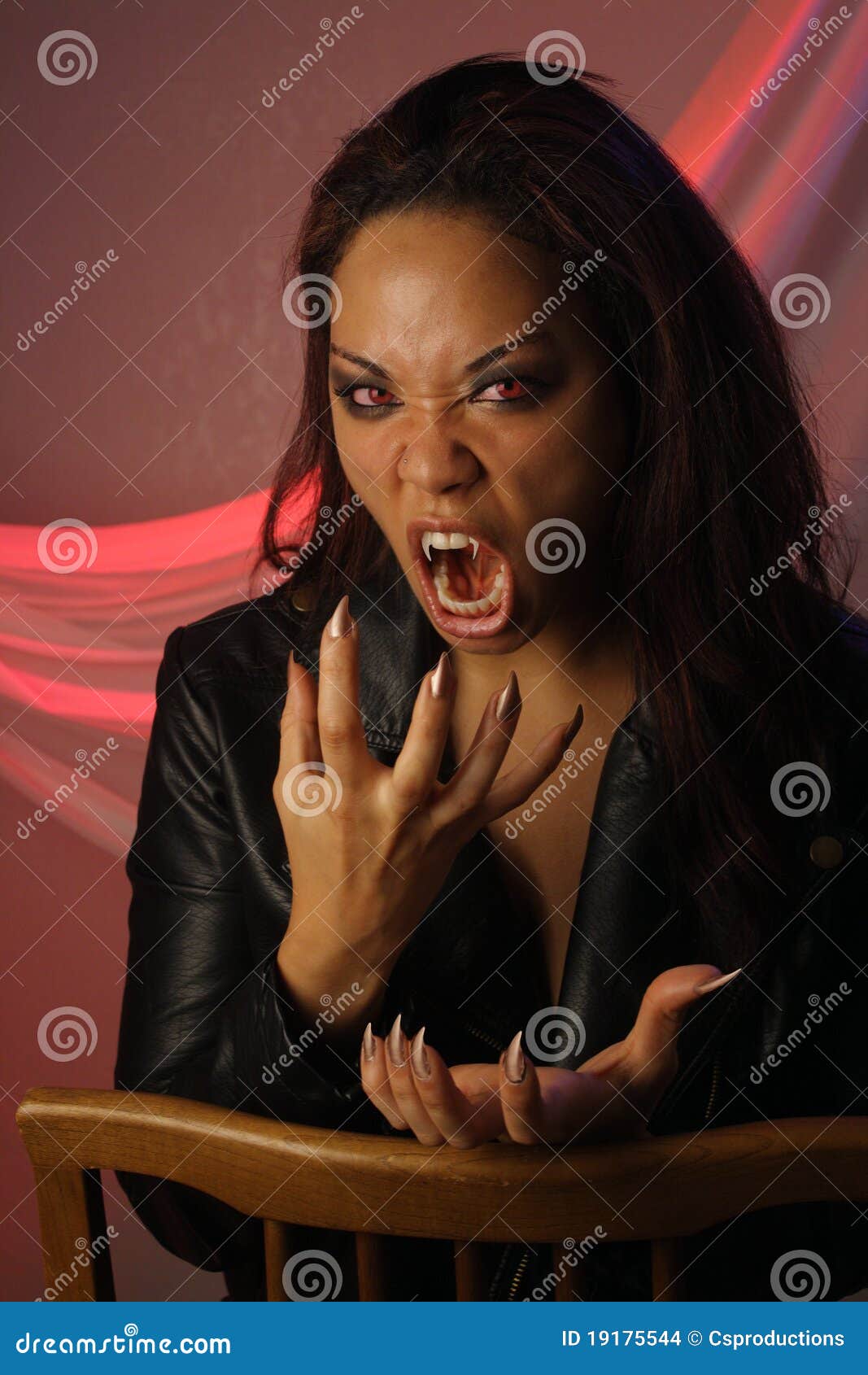 Female Vampire Showing Her Fangs Stock Image | CartoonDealer.com #25546063
