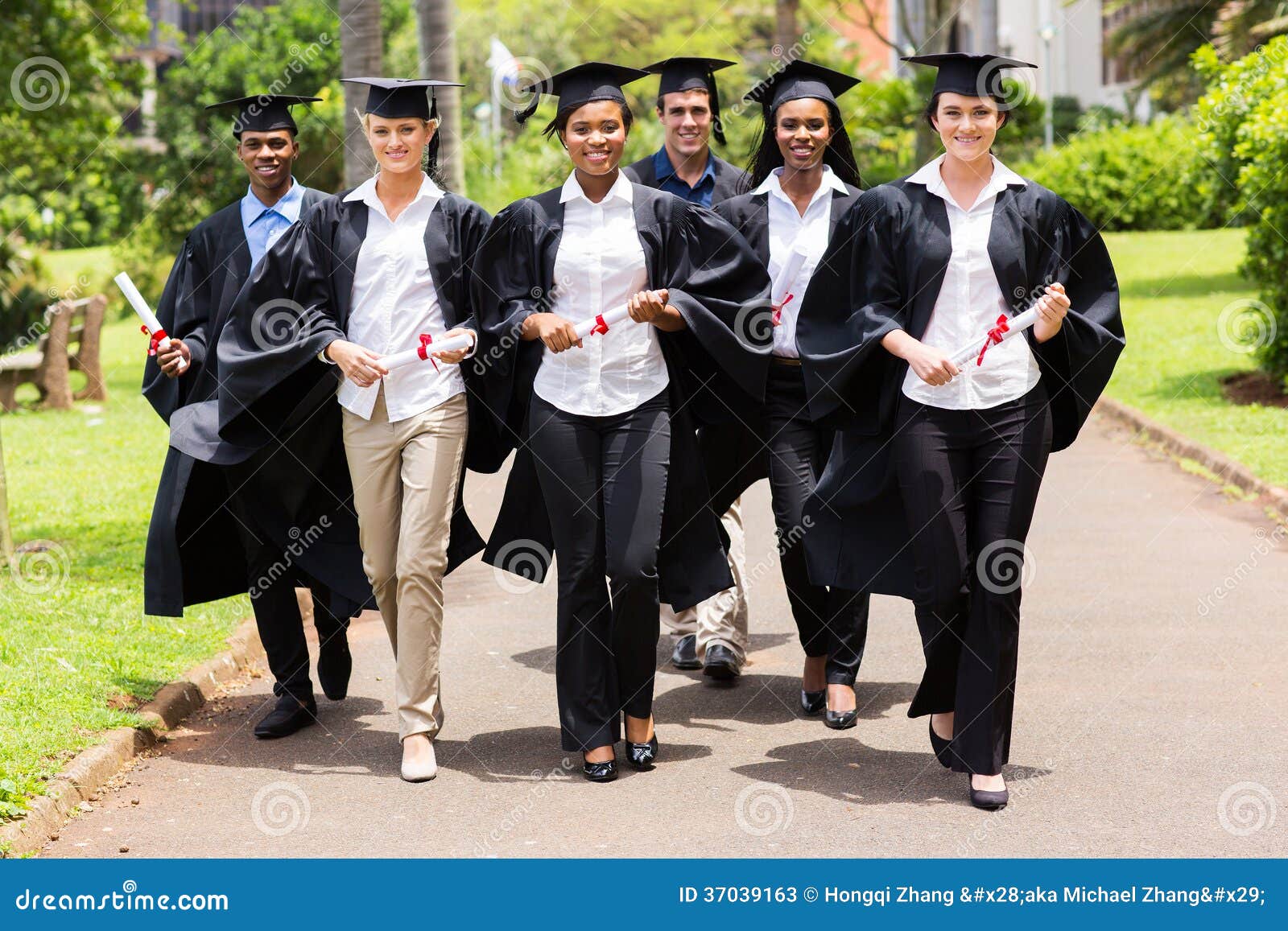 Multiracial Graduates Walking Stock Image - Image of diploma, ceremony ...