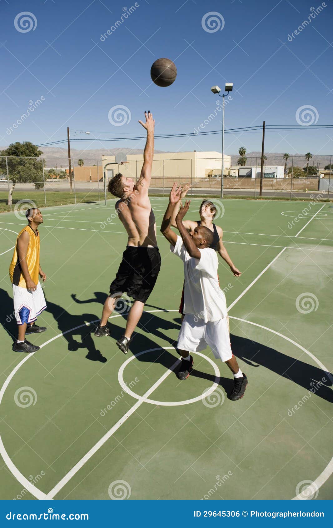Multiracial Group Playing Basket Ball Stock Photo - Image of american ...