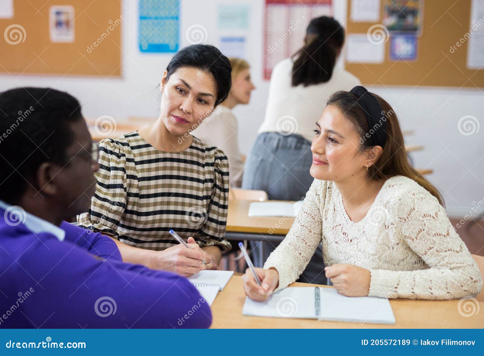 Multiracial Group of Students Working in Groups Stock Image - Image of ... Multiracial Group of Students Working in Groups Stock Image - Image of ...