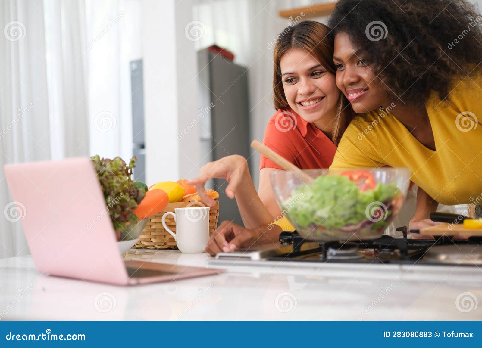 Multiracial Lesbian Couple Relaxing At Home Stock Image Image Of