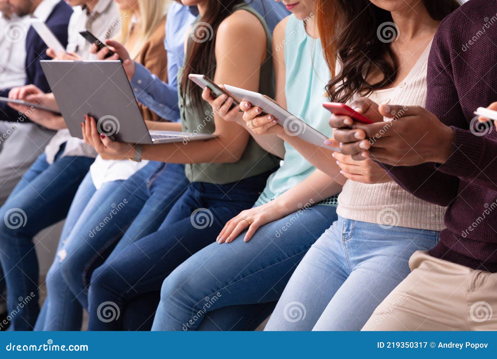 Group of Young People Using Various Electronic Gadgets Stock Image ...