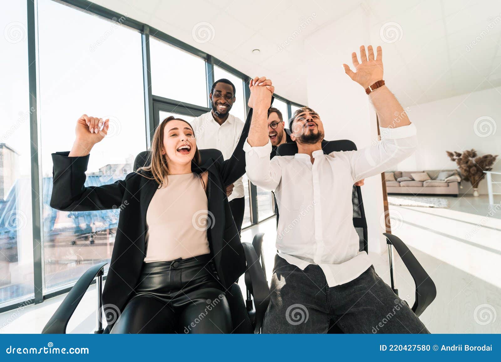Multiracial Office Workers Having Fun Together in Office. Stock Photo ...