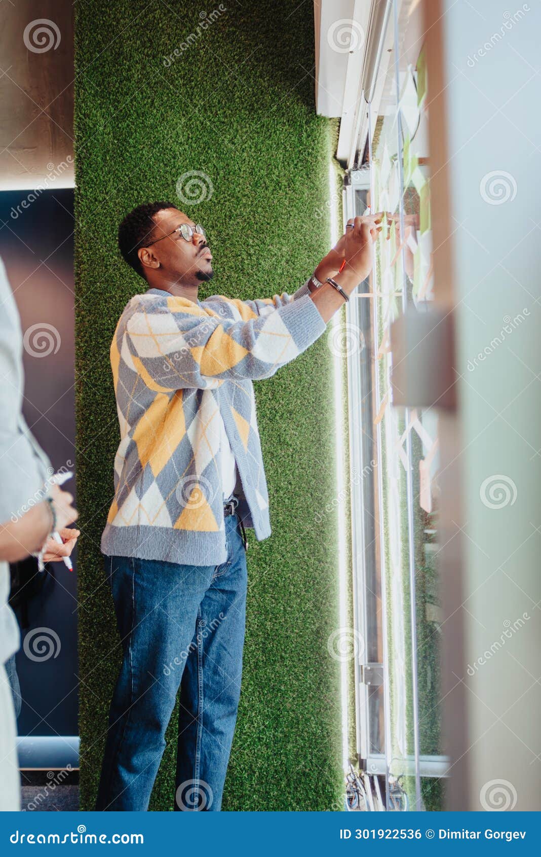 Multiracial Professionals Collaborate in a Modern Office, Sharing Ideas ...