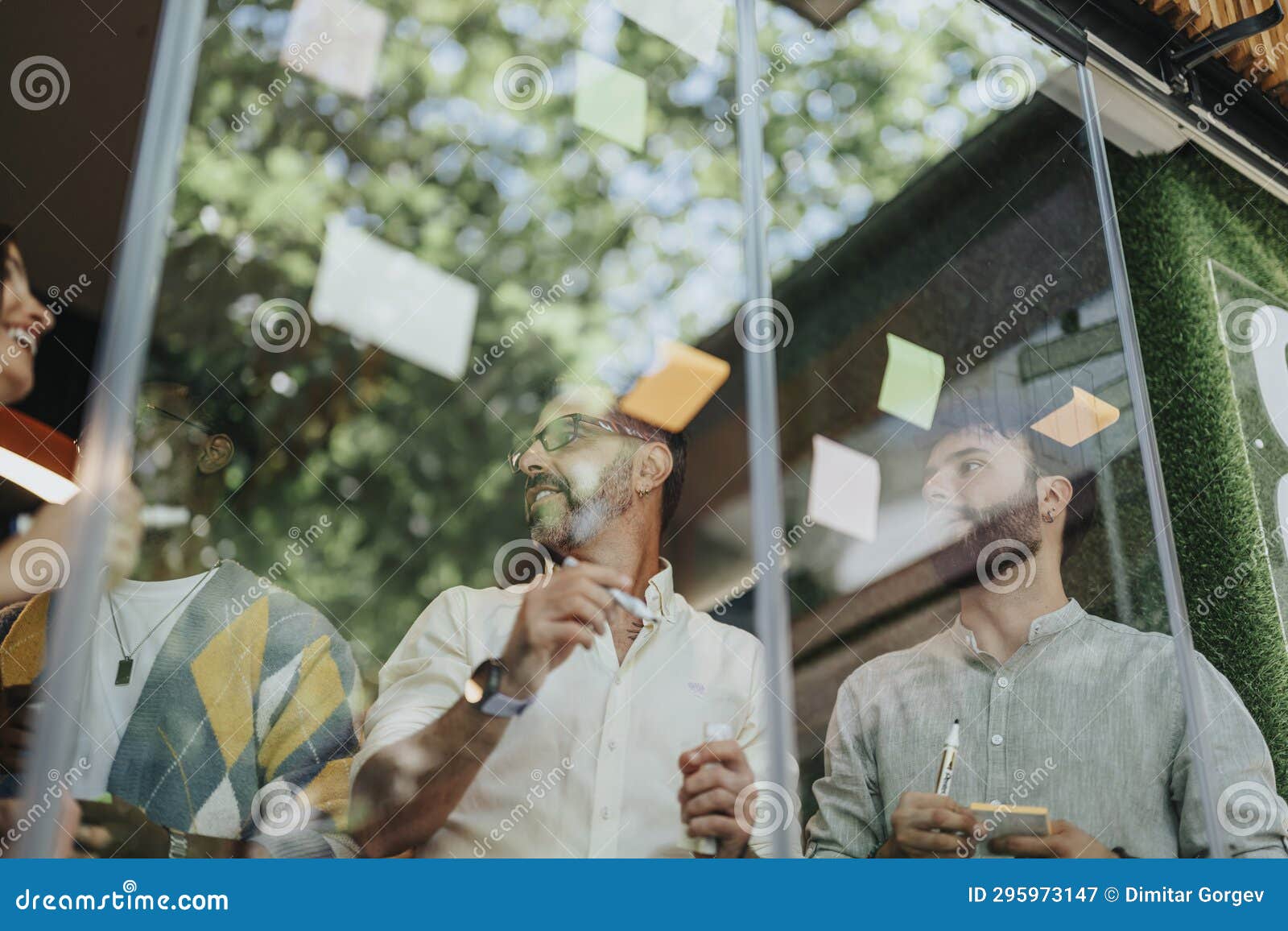 Multiracial Start-up Team Sharing Knowledge, Working Together in Modern ...