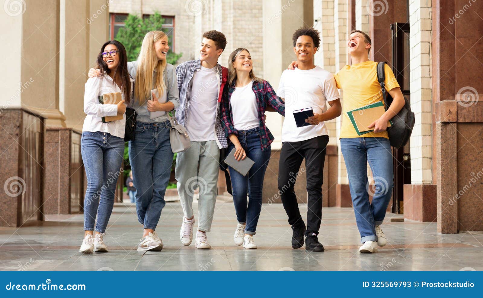 Multiracial Students Walking after Classes in University Campus Stock ...