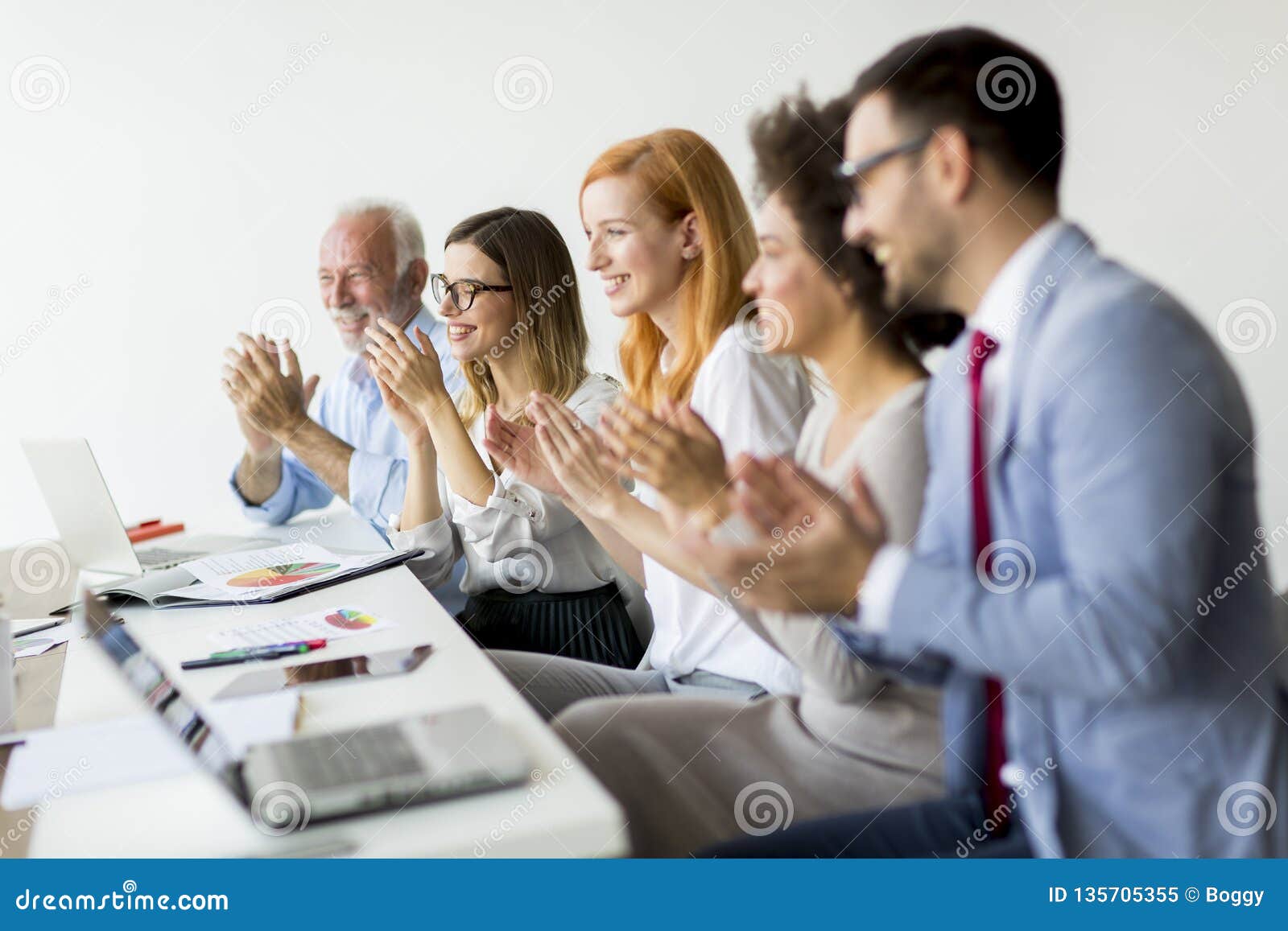 Multiracial Young Business People Clapping Hands in Office Stock Image ...
