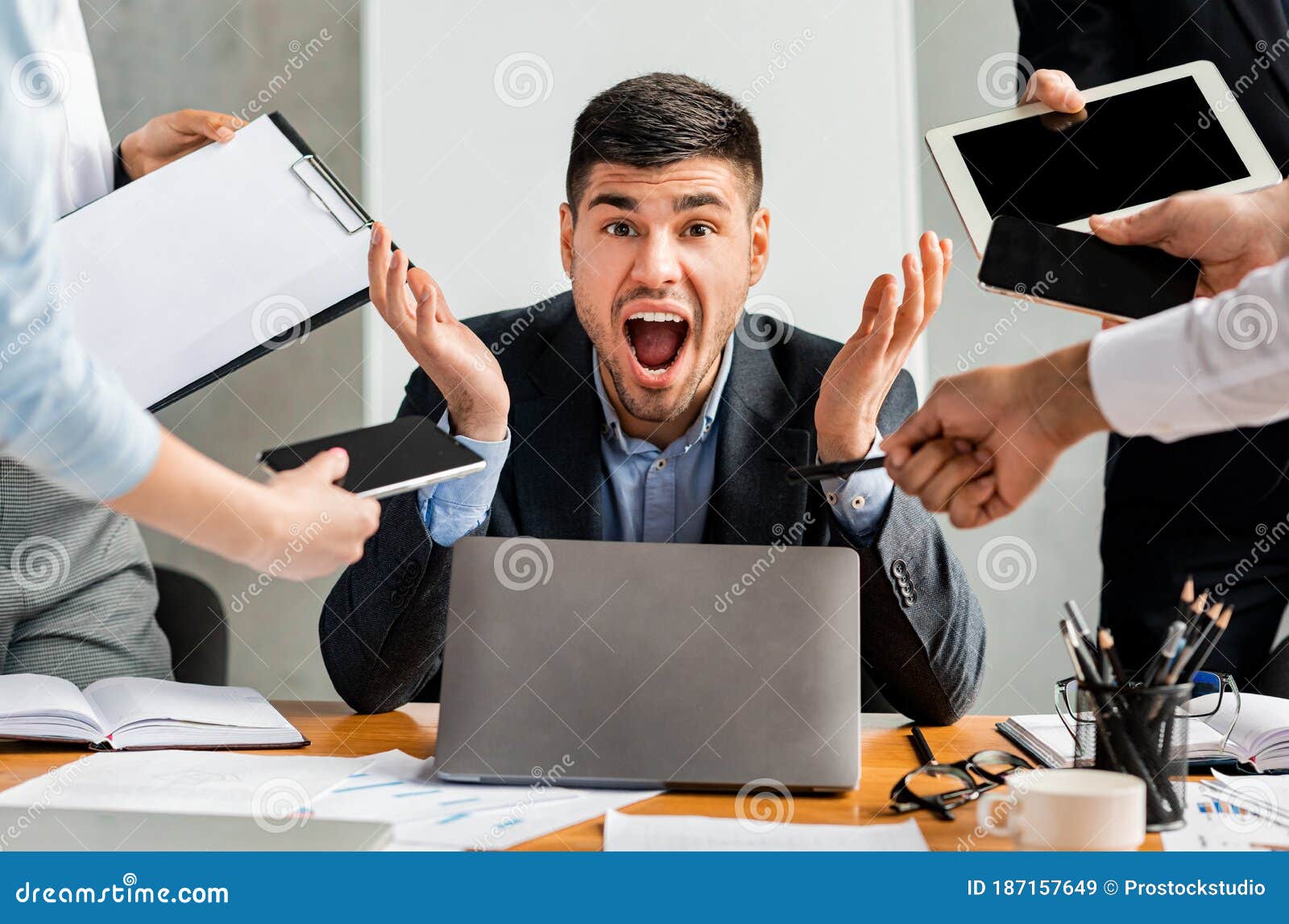 Businessman Shouting Stressed by Multiple Tasks Sitting in Modern ...