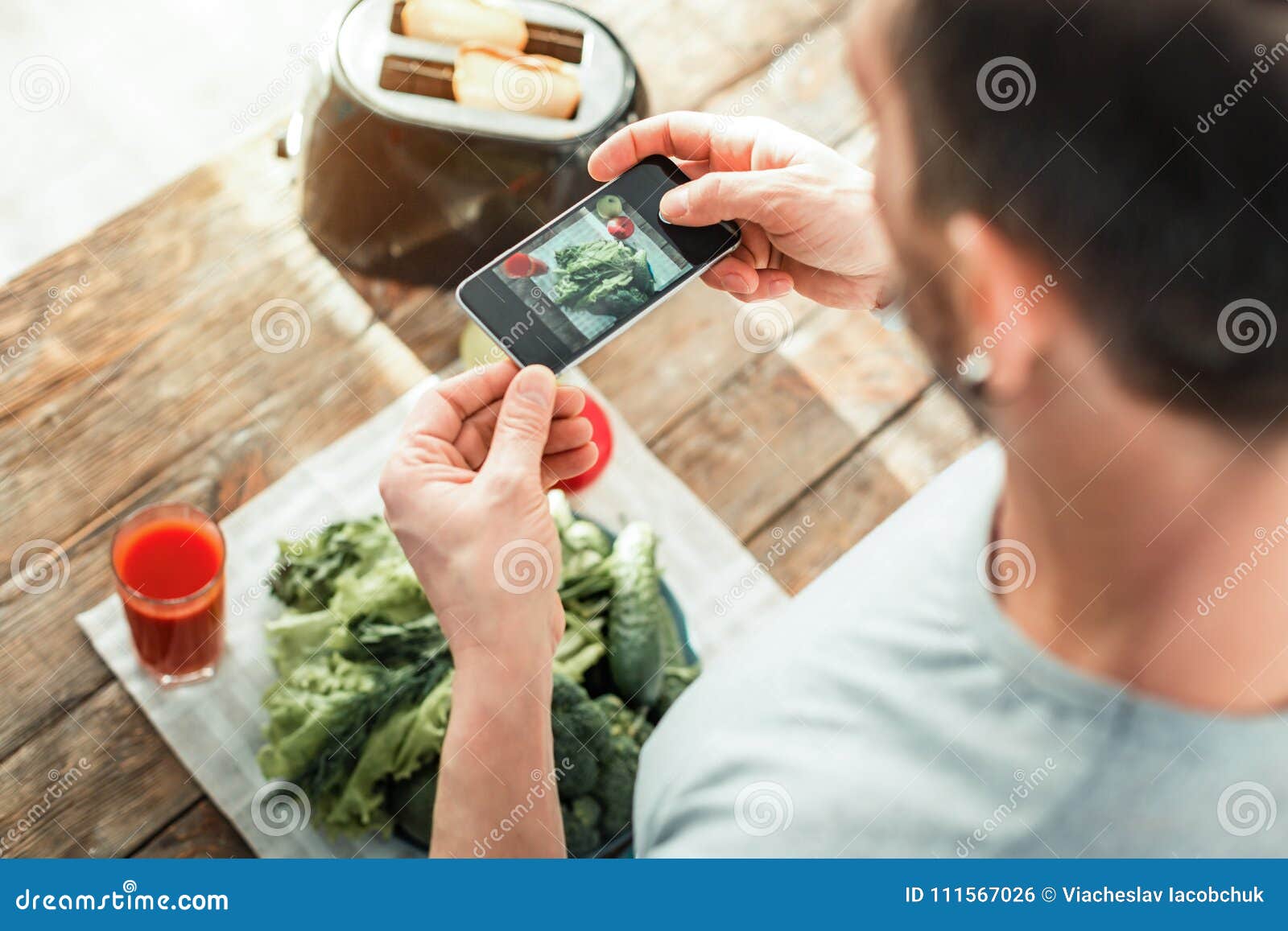 Multitasking Functional Smartphone Being in Mans Hands. Stock Photo ...