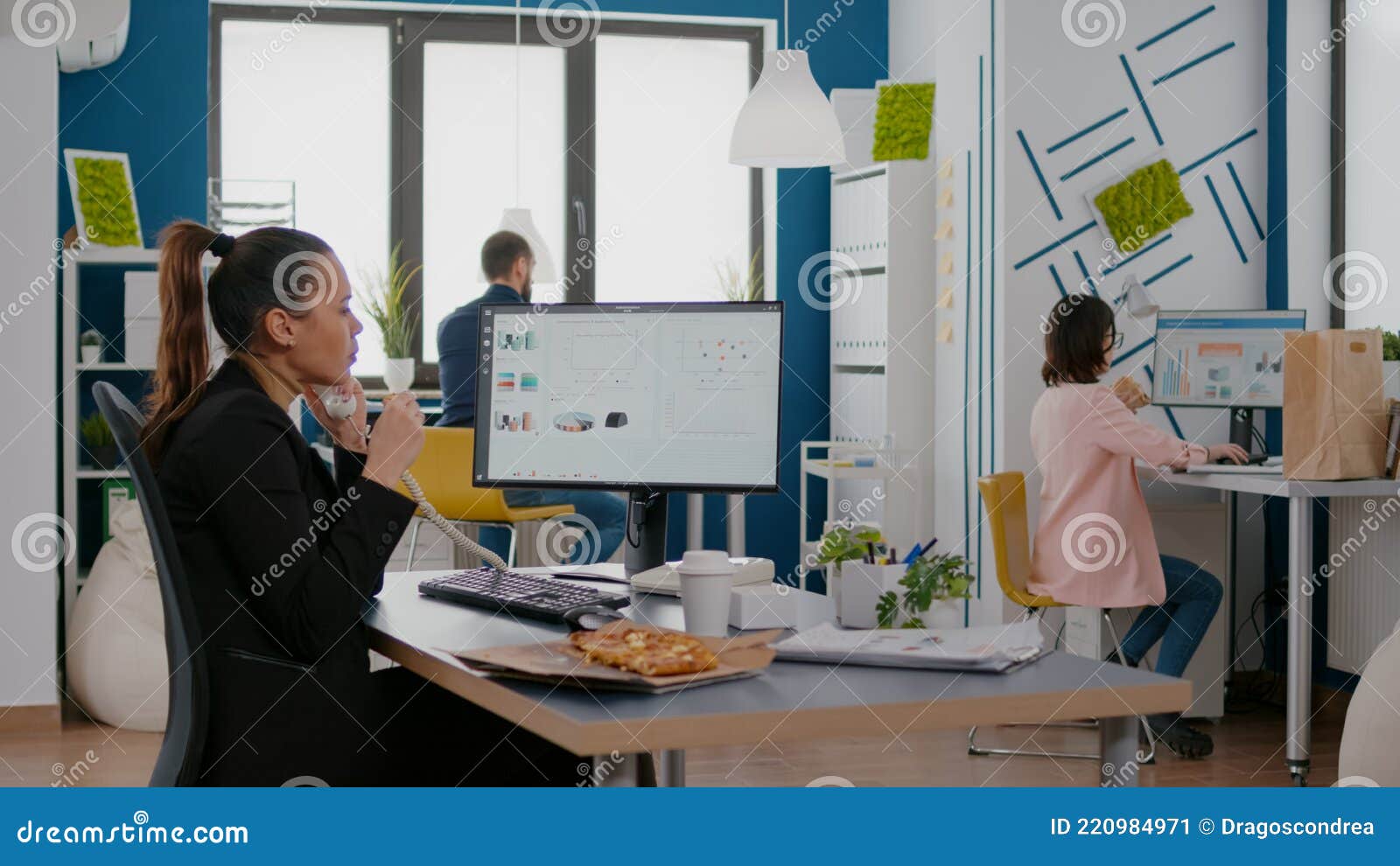 Multitasking Manager Discussing Marketing Strategy with Remote Worker ...