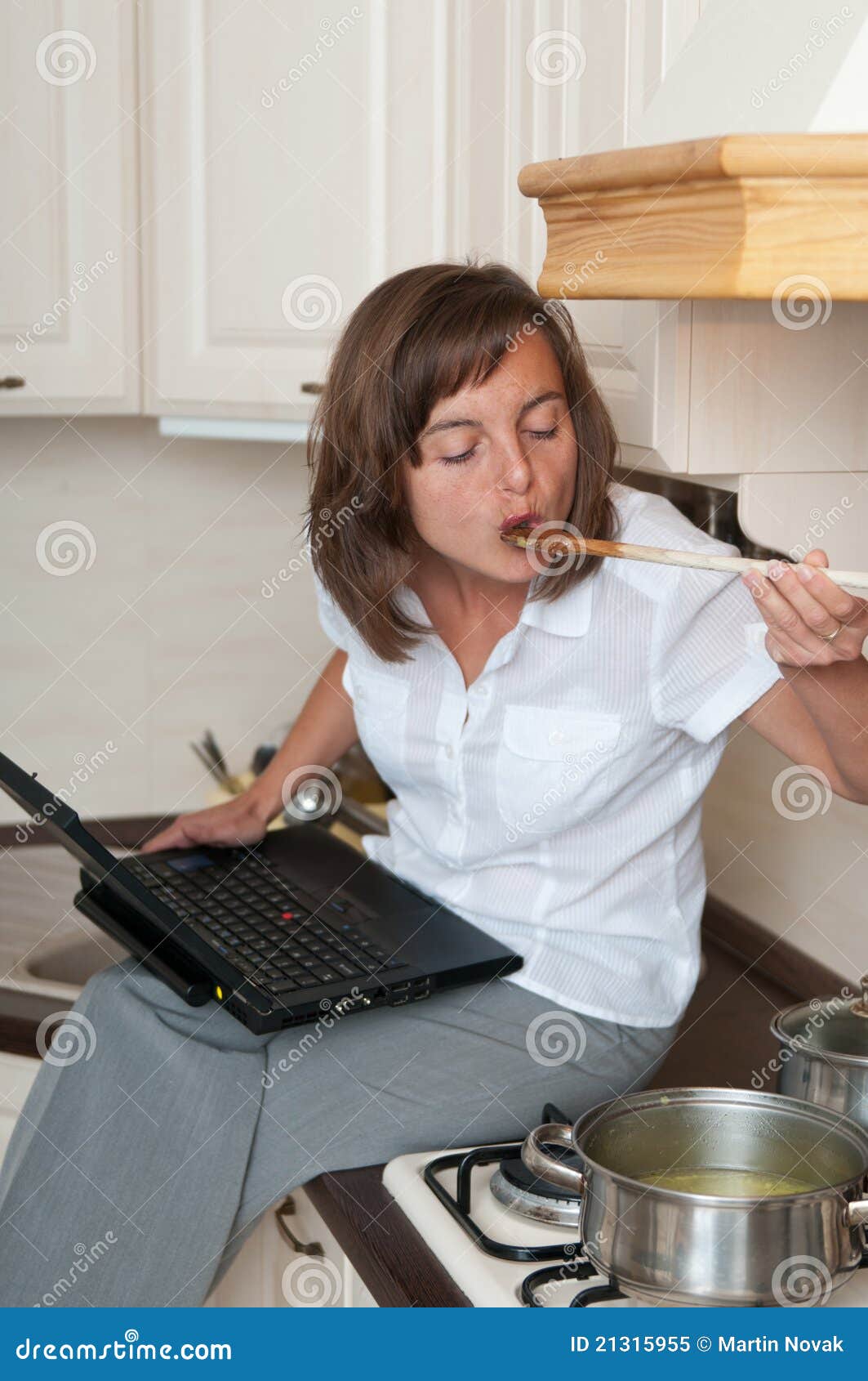 Multitasking Woman - Cooking Meal and Working Stock Image - Image of ...