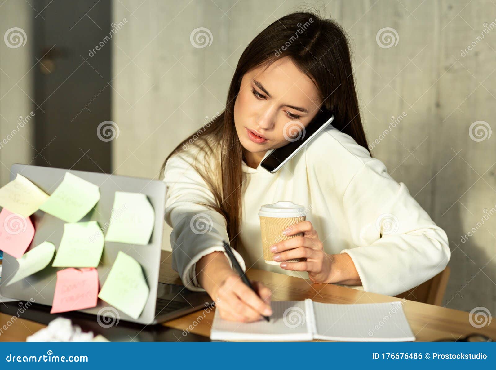 Multitasking at Work Concept. Woman Speaks on Phone, Writes and Drinks ...