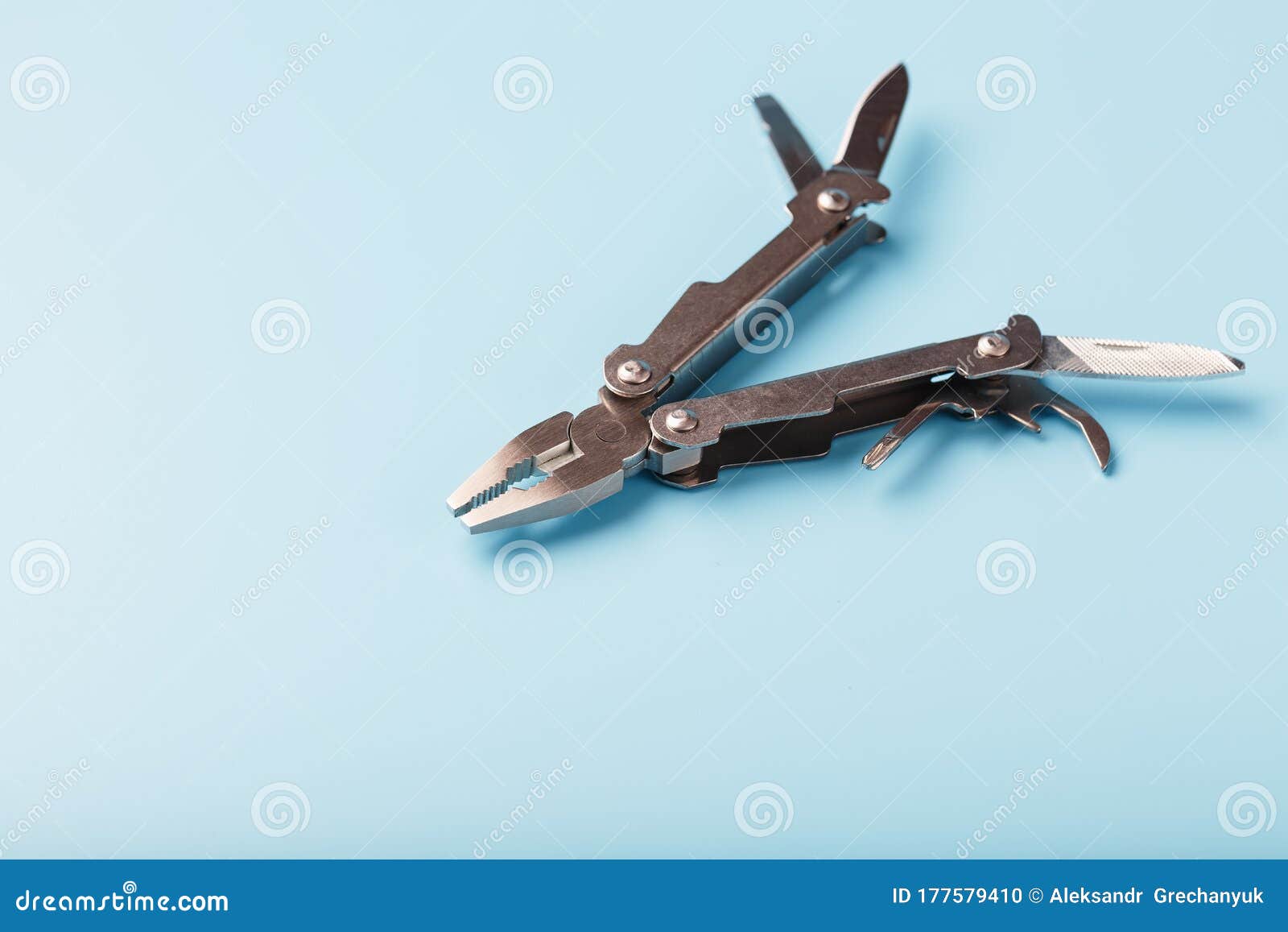 Multitool Is A Multi-functional Tool On A Black Background. The Concept ...