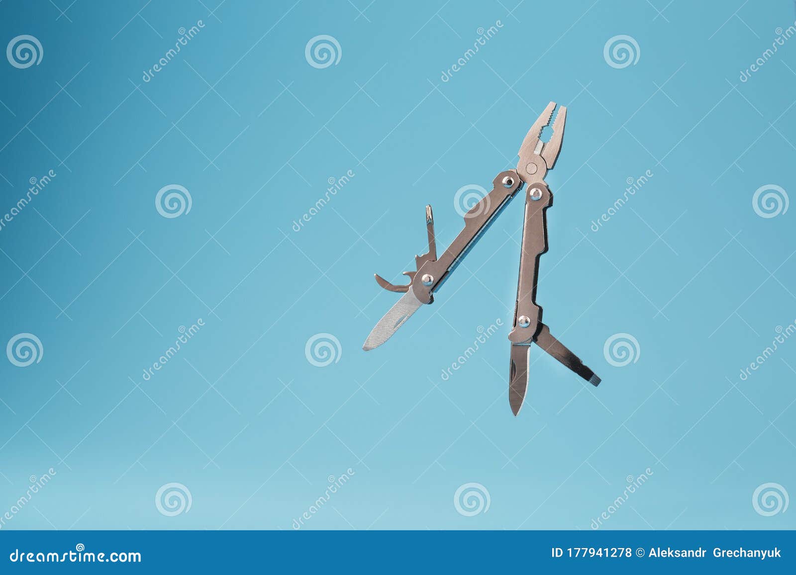 Multitool Is A Multi-functional Tool On A Black Background. The Concept ...