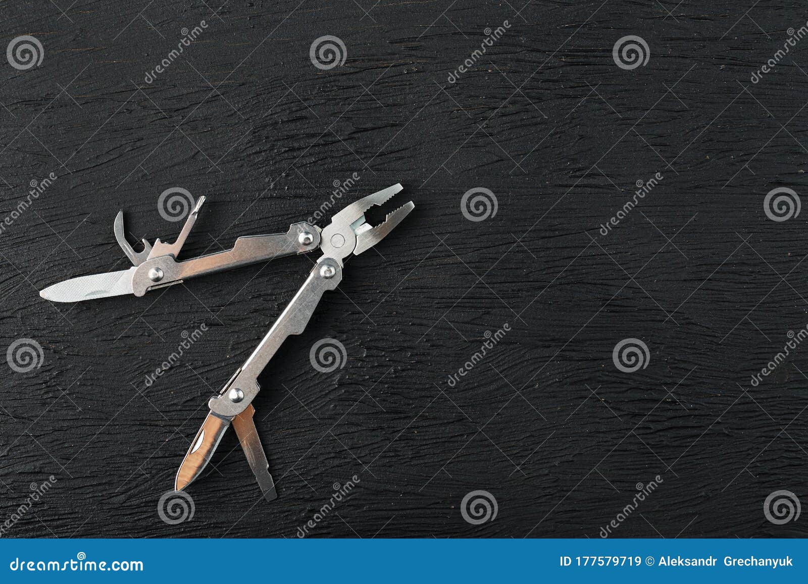 Multitool is a Multi-functional Tool on a Black Background. the Concept ...