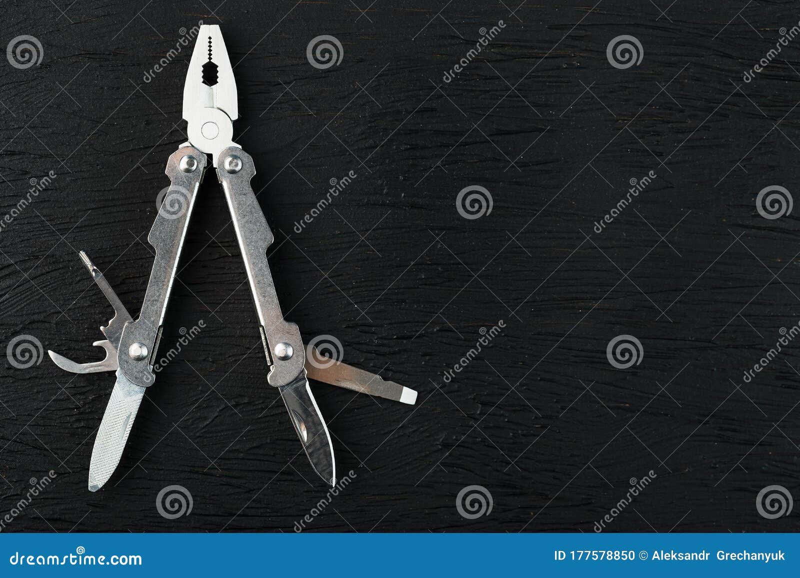 Multitool is a Multi-functional Tool on a Black Background. the Concept ...