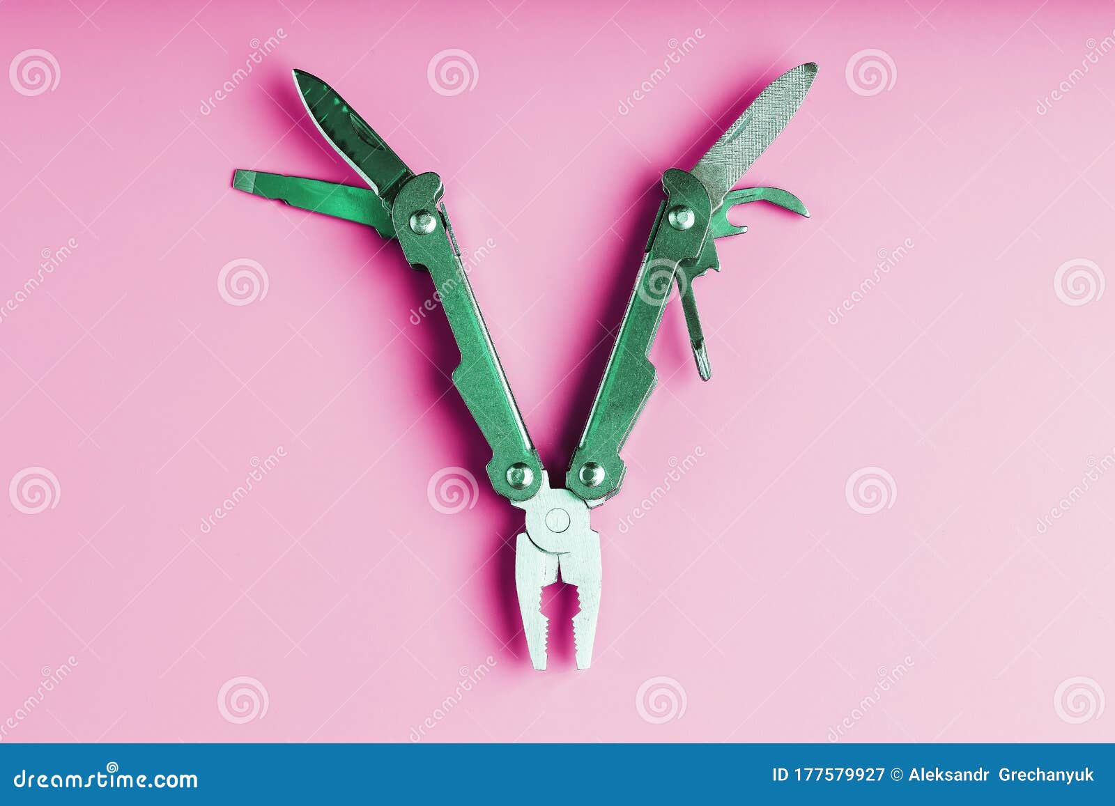 Multitool is a Multi-functional Tool on a Pink Background. the Concept ...