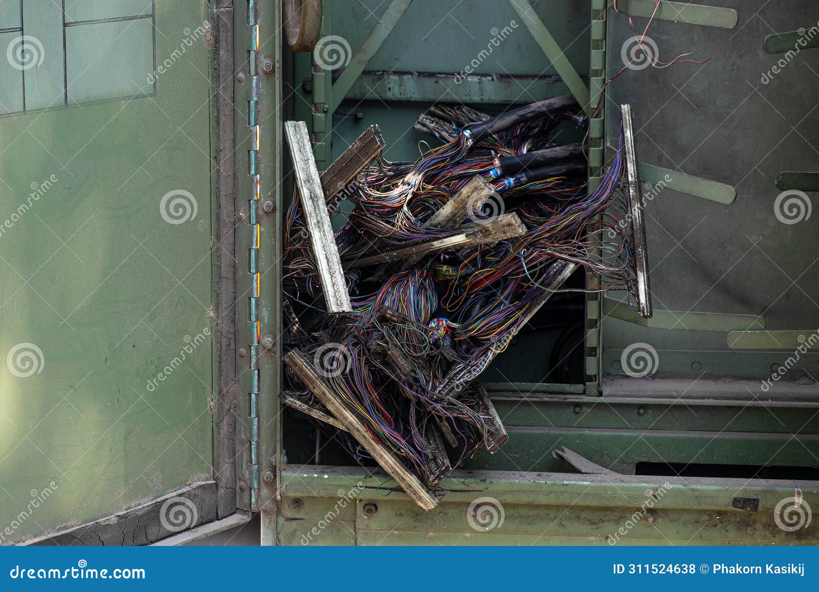 A Multitude of Electric and Telephone Signal Cables Tangled Together in ...