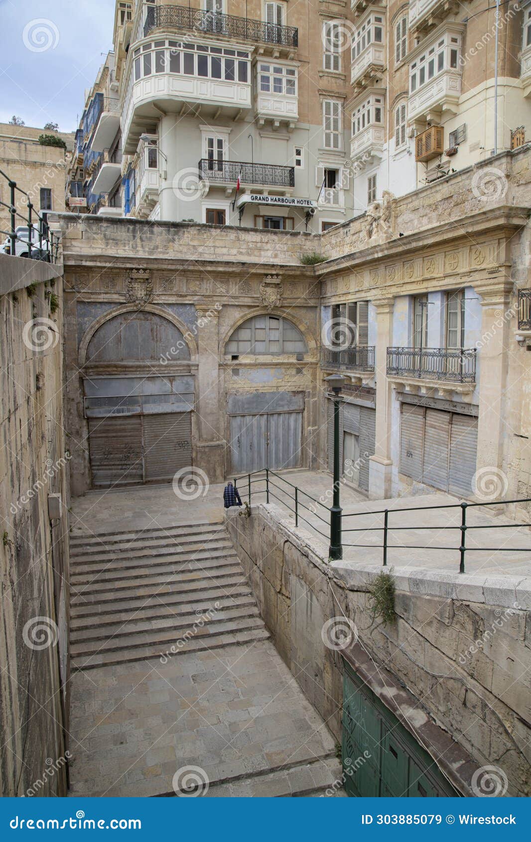 Multitude of Windows and a Set of Stairs Leading To Its Lower Level in ...
