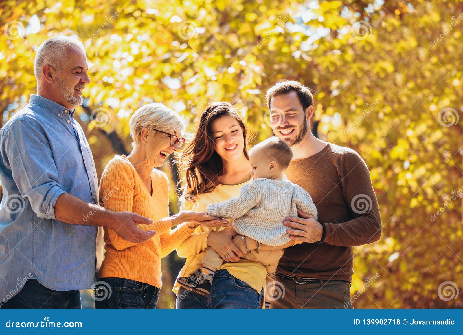 Multi Generation Family in Autumn Park Stock Photo - Image of people ...