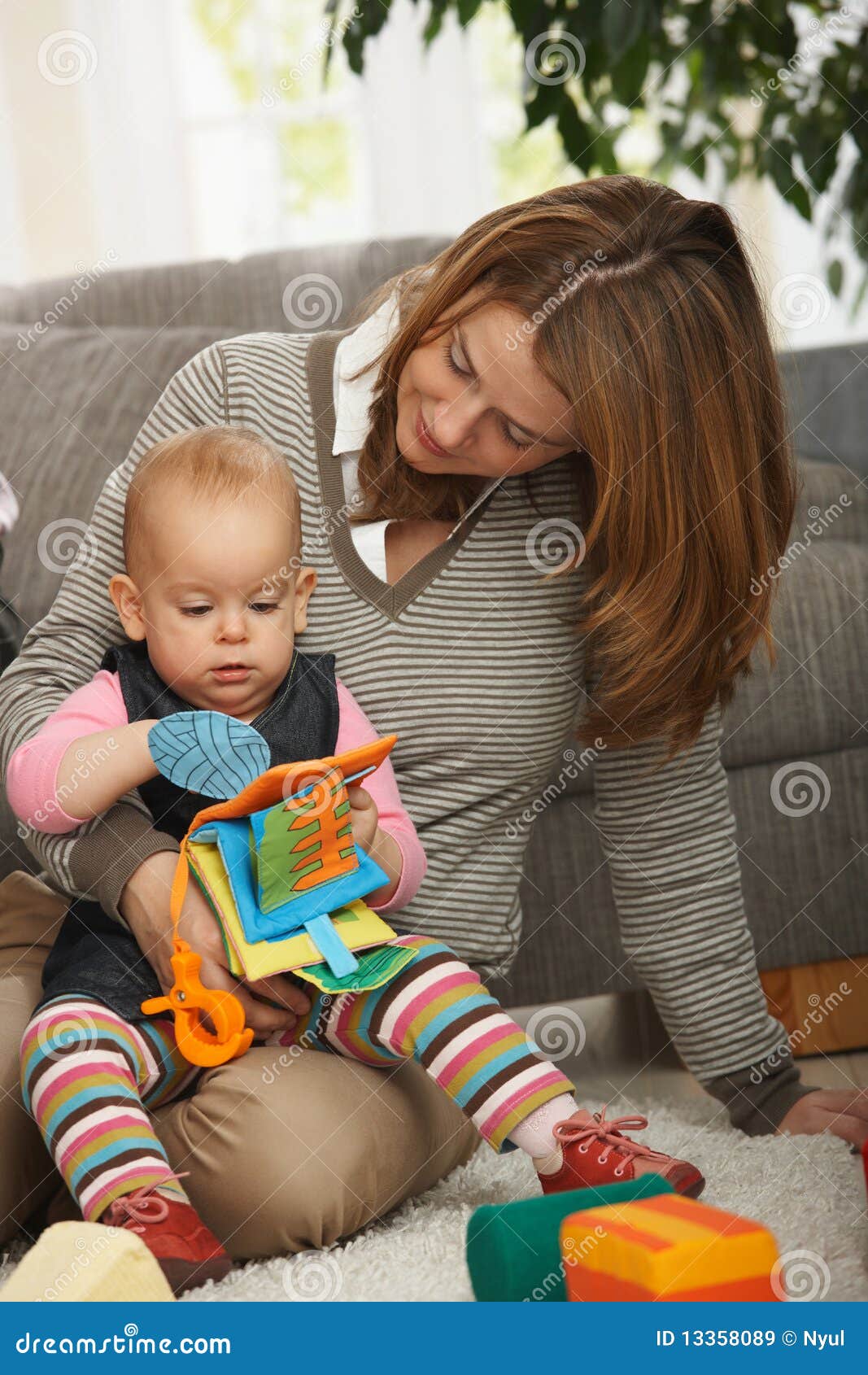 Mum and baby playing stock image. Image of baby, beautiful - 13358089