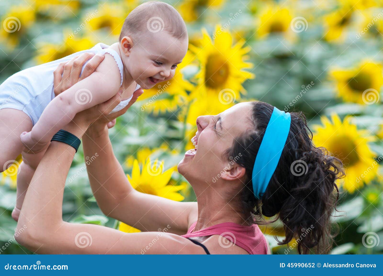 Mum and baby stock photo. Image of baby, sunflower, communion - 45990652
