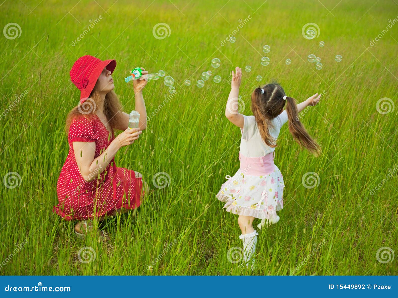 Mum and Daughter Starting Up Soap Bubbles Stock Photo - Image of mother ...