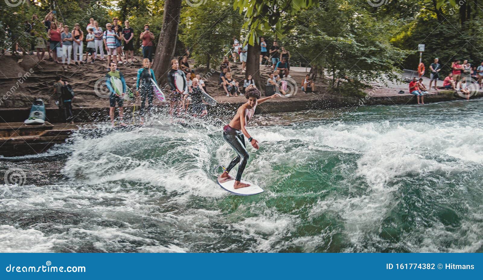 MUNICH - SEPTEMBER 19: Surfer Works the Wave at the Eisbachwell ...