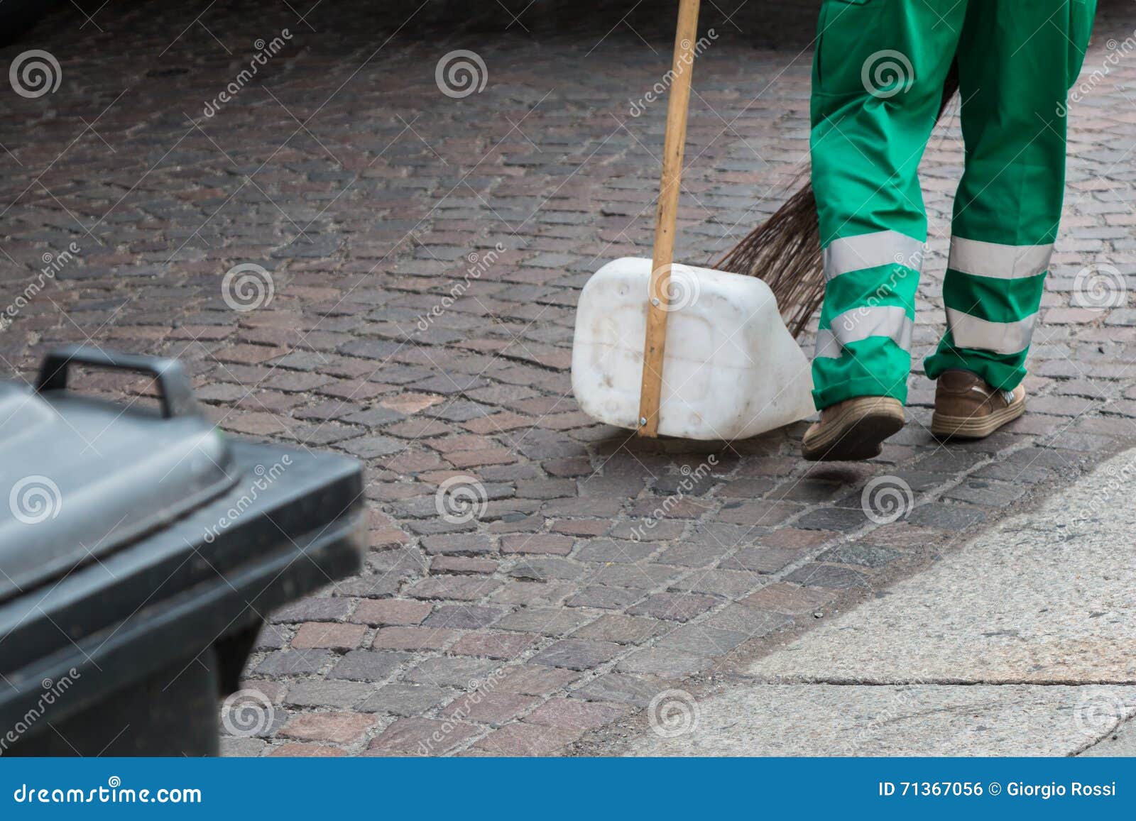 Dustman Worker Is Moving Empty Garbage Container From Truck Royalty ...