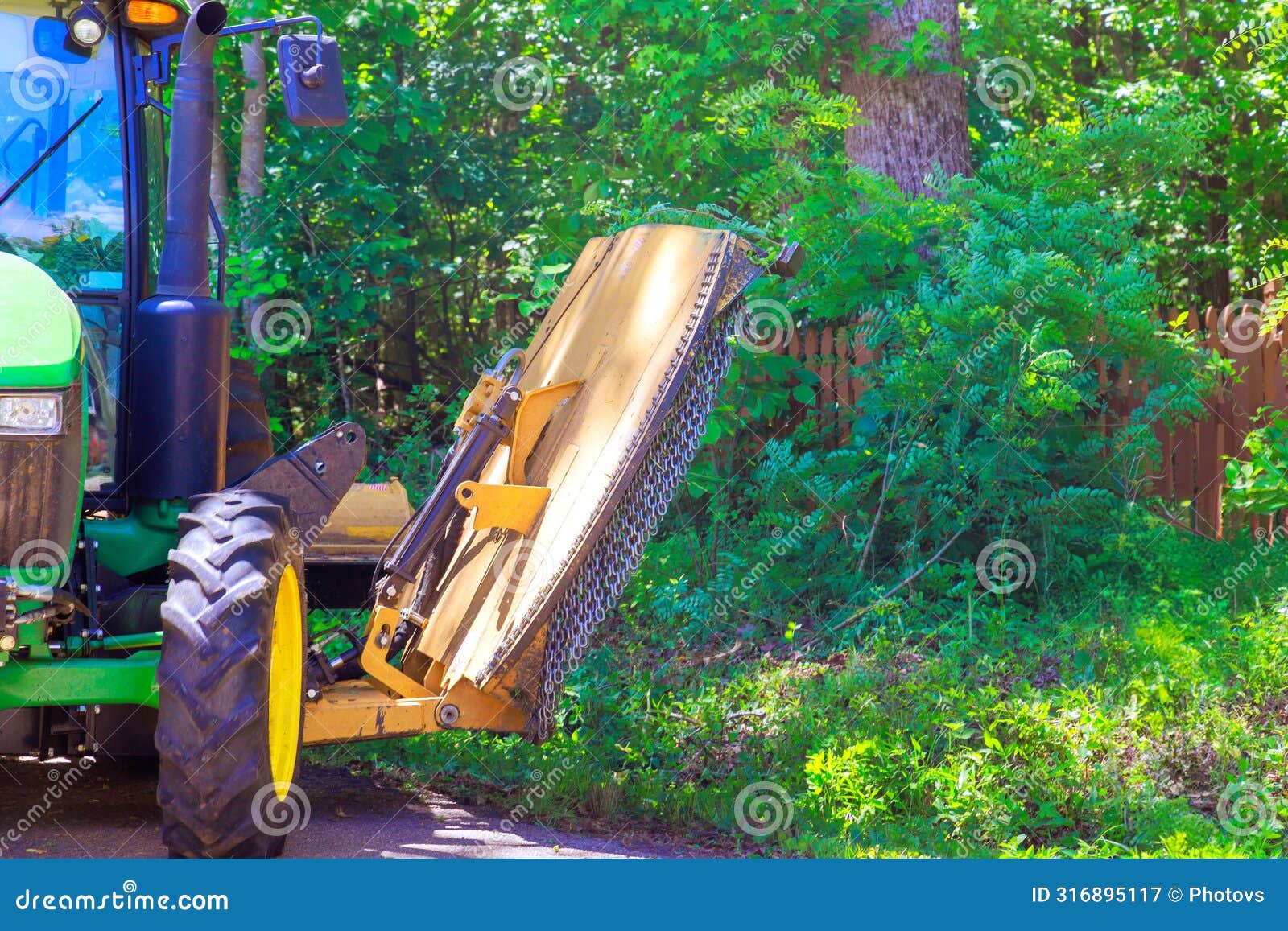 Municipal Service Tractor with Mower Cutting Grass Branches on Both ...