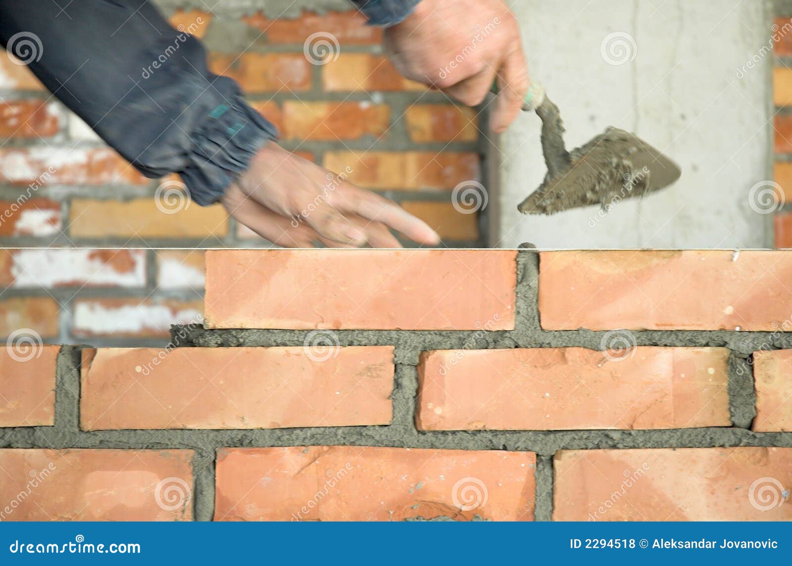 Murare arkivfoto. Bild av lärling, mortel, murlager, murslev - 2294518