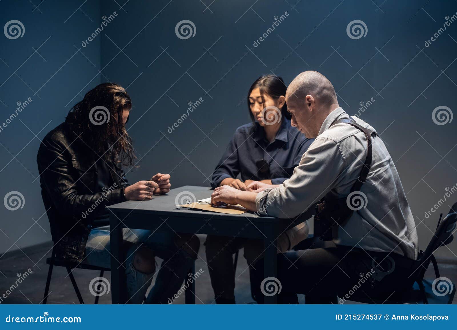 The Murder Suspect is in the Interrogation Room with a Grim ...