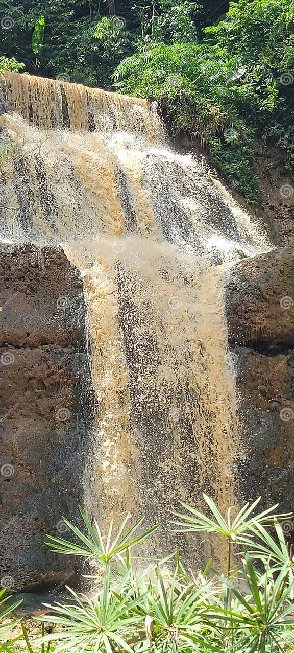 Murkey and Muddy Waterfall stock image. Image of waterfall - 282291215
