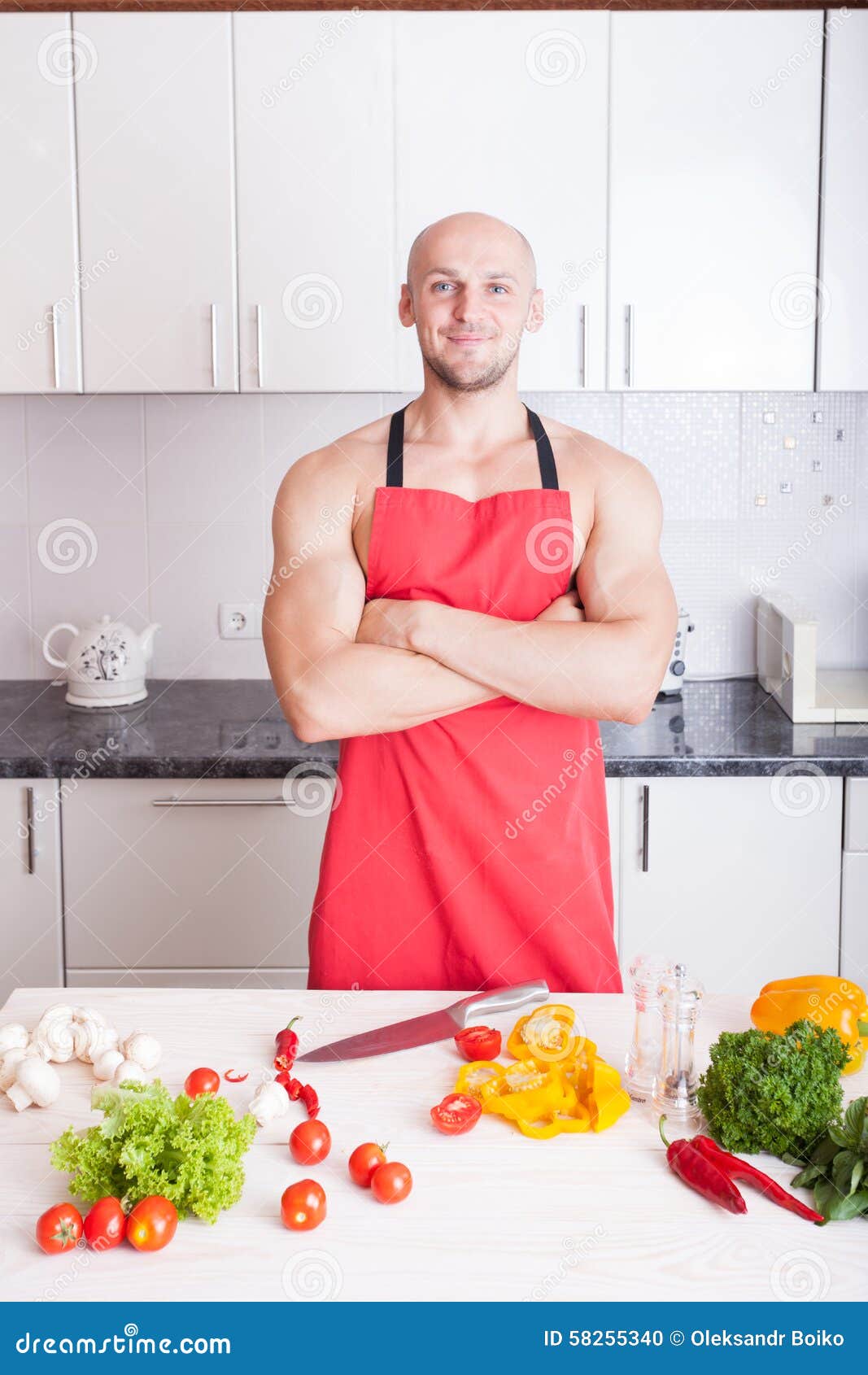 Muscle man cooking stock photo. Image of salad, kitchen - 58255340