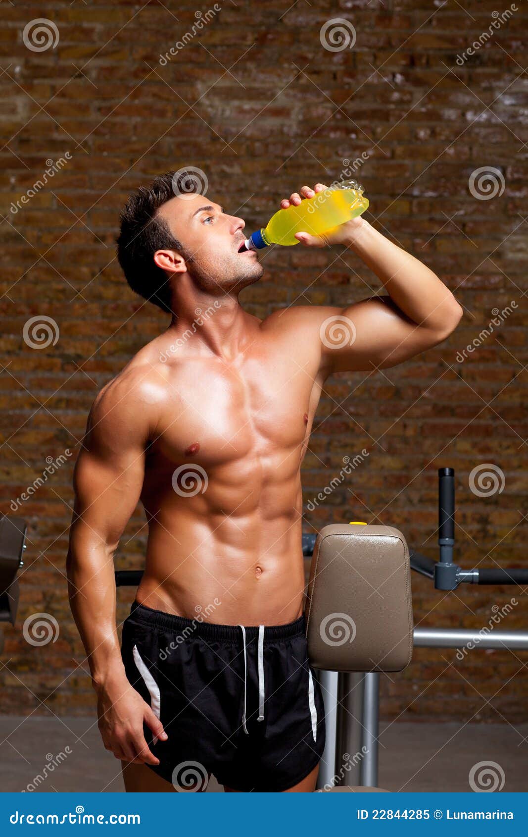 Muscle Man at Gym Relaxed with Energy Drink Stock Image - Image of ...
