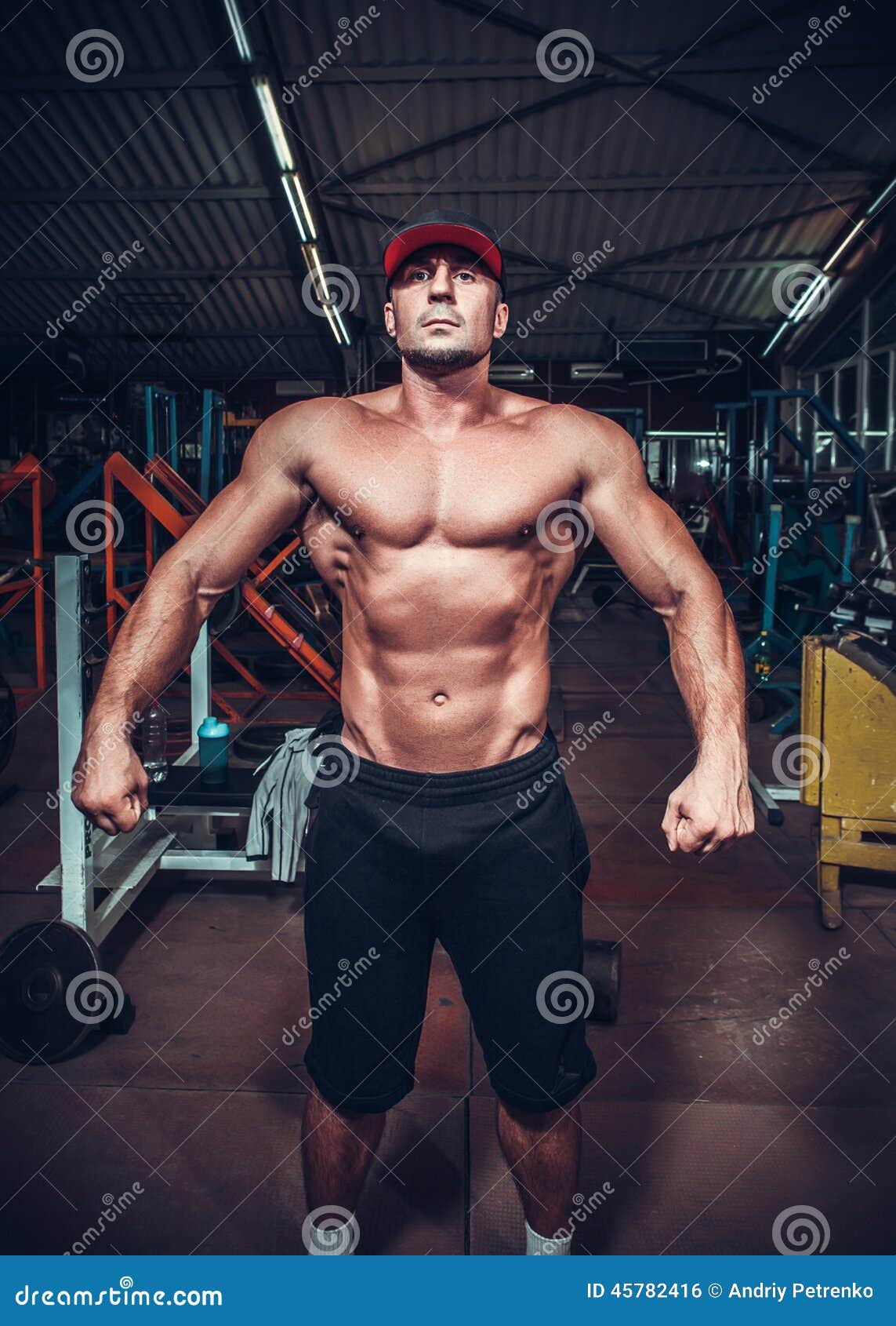 Muscle man who is posing stock photo. Image of body, attractive - 45782416