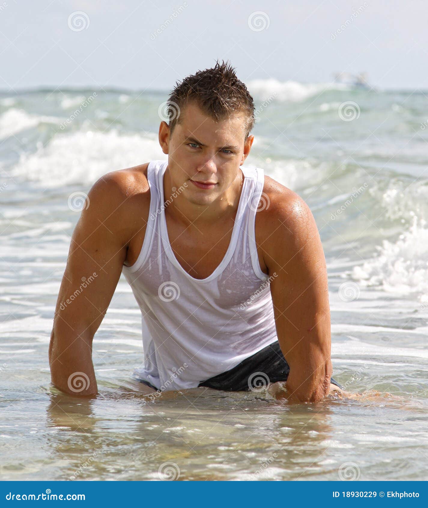 Muscle wet man stock image. Image of beach, jersey, drops - 18930229