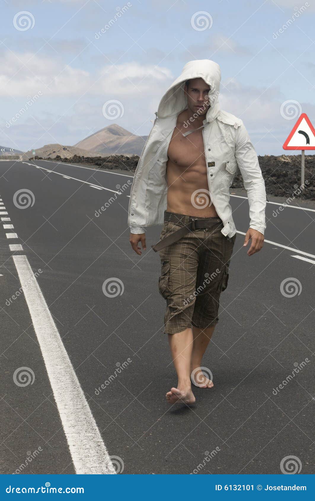 Muscled Man Walking on the Road Stock Image - Image of muscled, arms ...