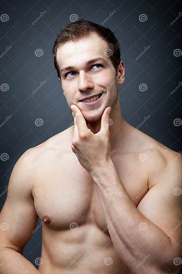 Muscles or Brain? Muscular Man Thinking Stock Photo - Image of ...